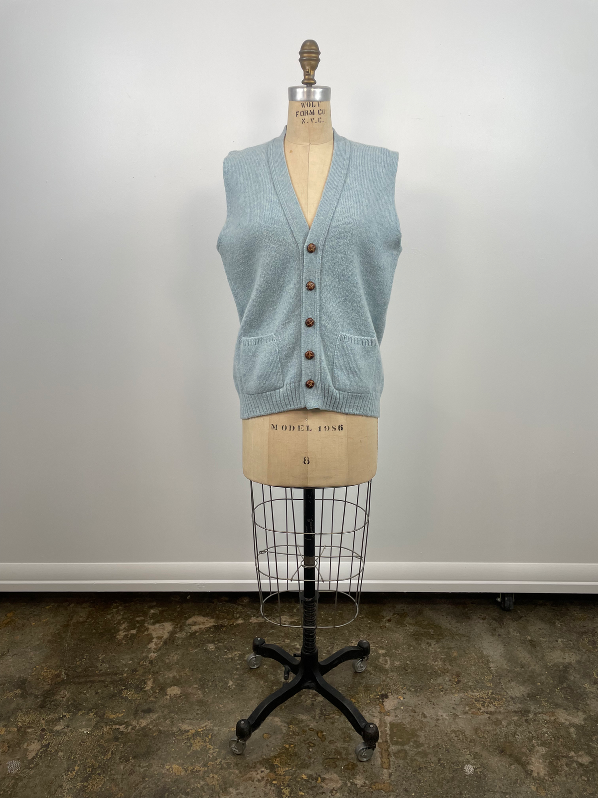 V. Light Blue Sweater Vest